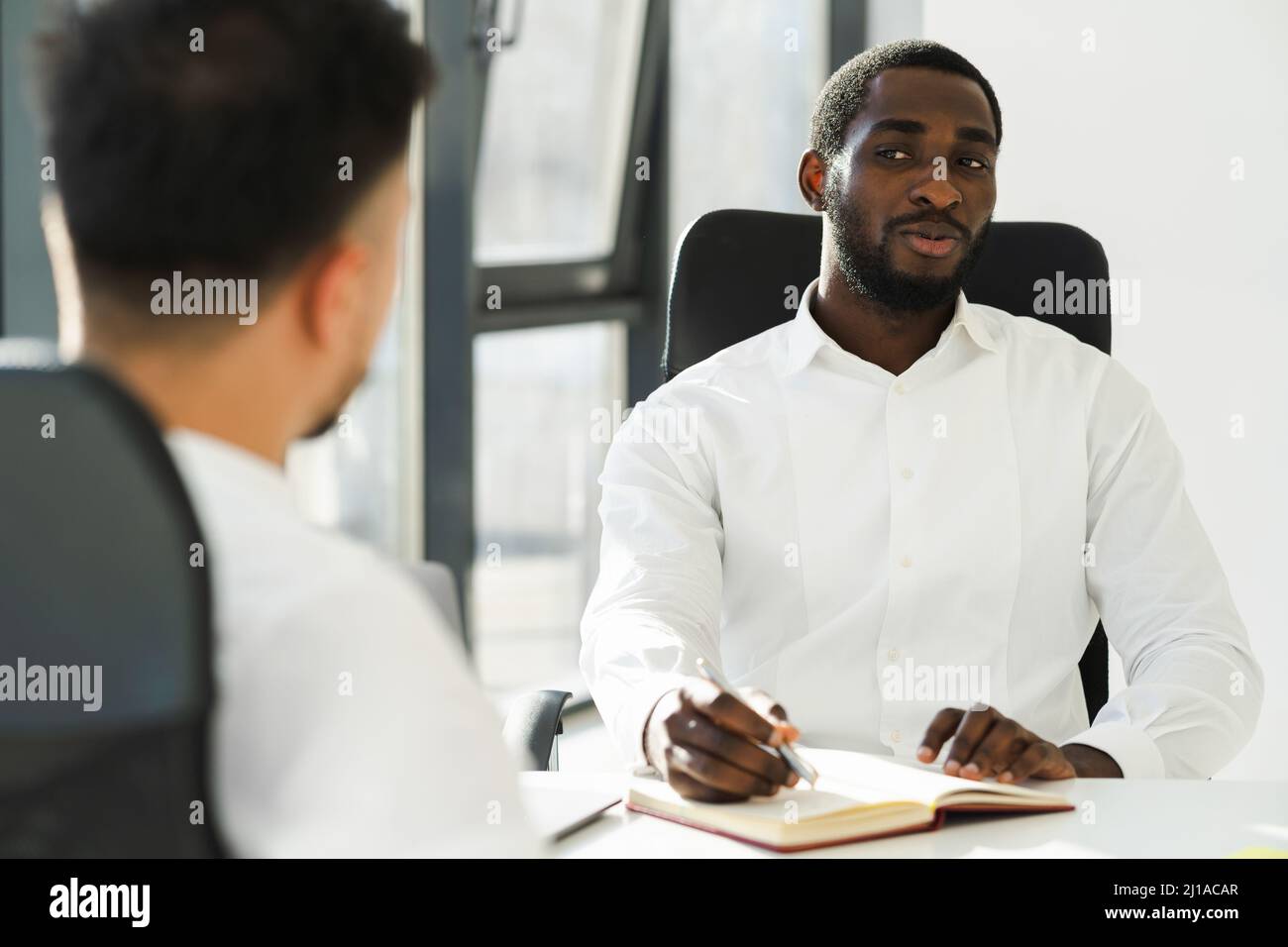 Interviewing employee hi-res stock photography and images - Alamy