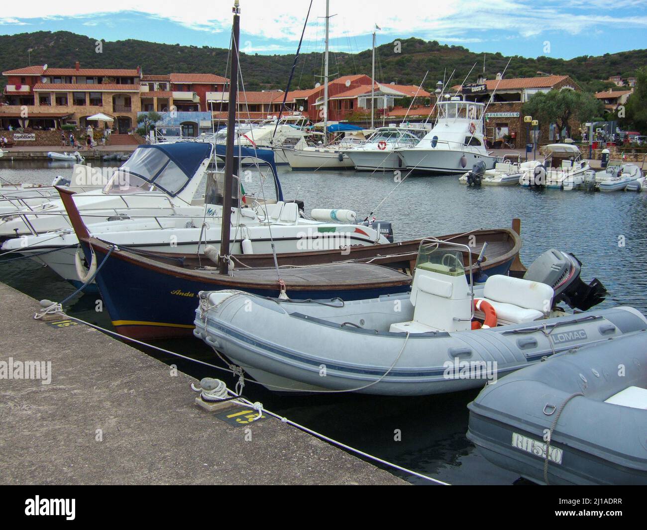 Budoni, Italy - August 16 2014: Yachts and sailboats in the port of ...