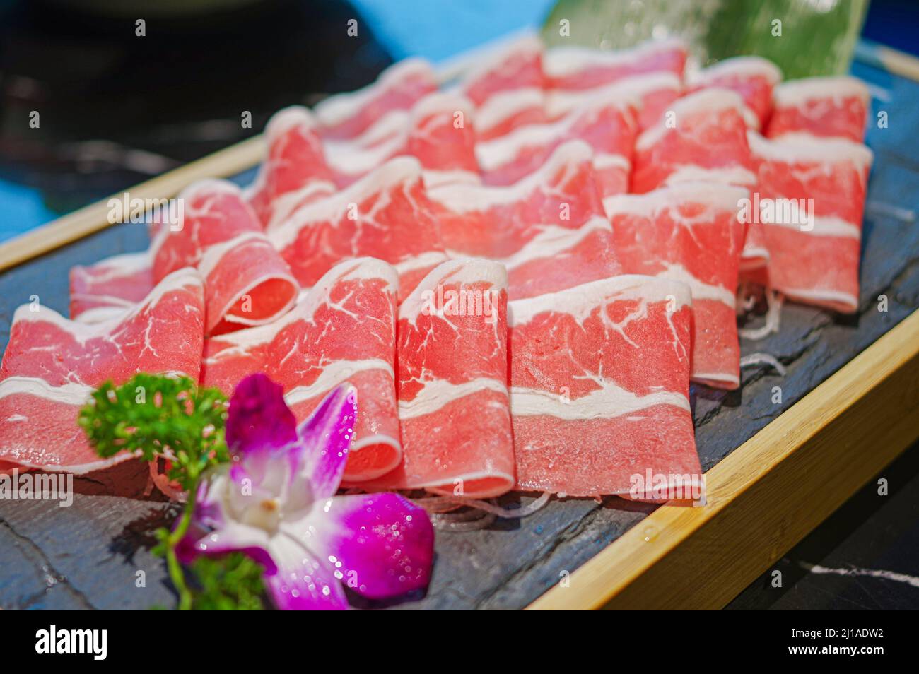 Raw mutton lamb beef meat slices for hot pot on slate stone plate Stock ...