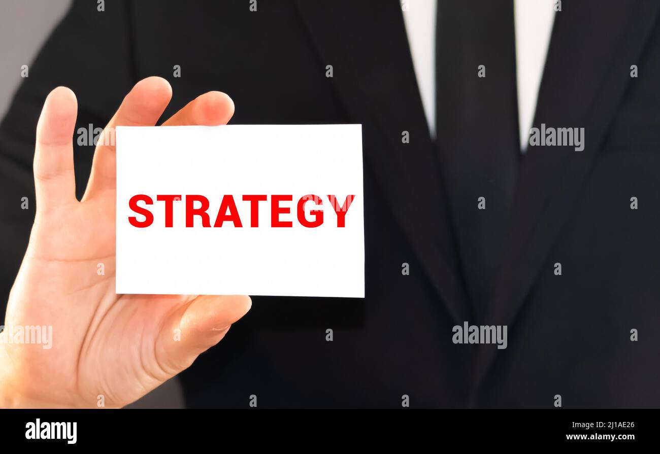 Businessman's Hand writing Strategy on glass, concept Stock Photo - Alamy
