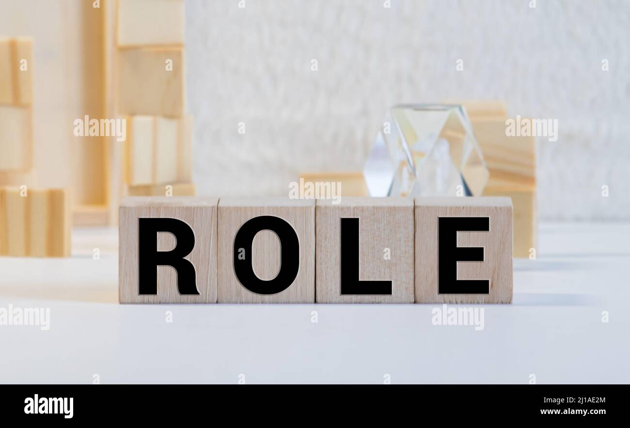 Role word from wooden blocks on desk Stock Photo - Alamy