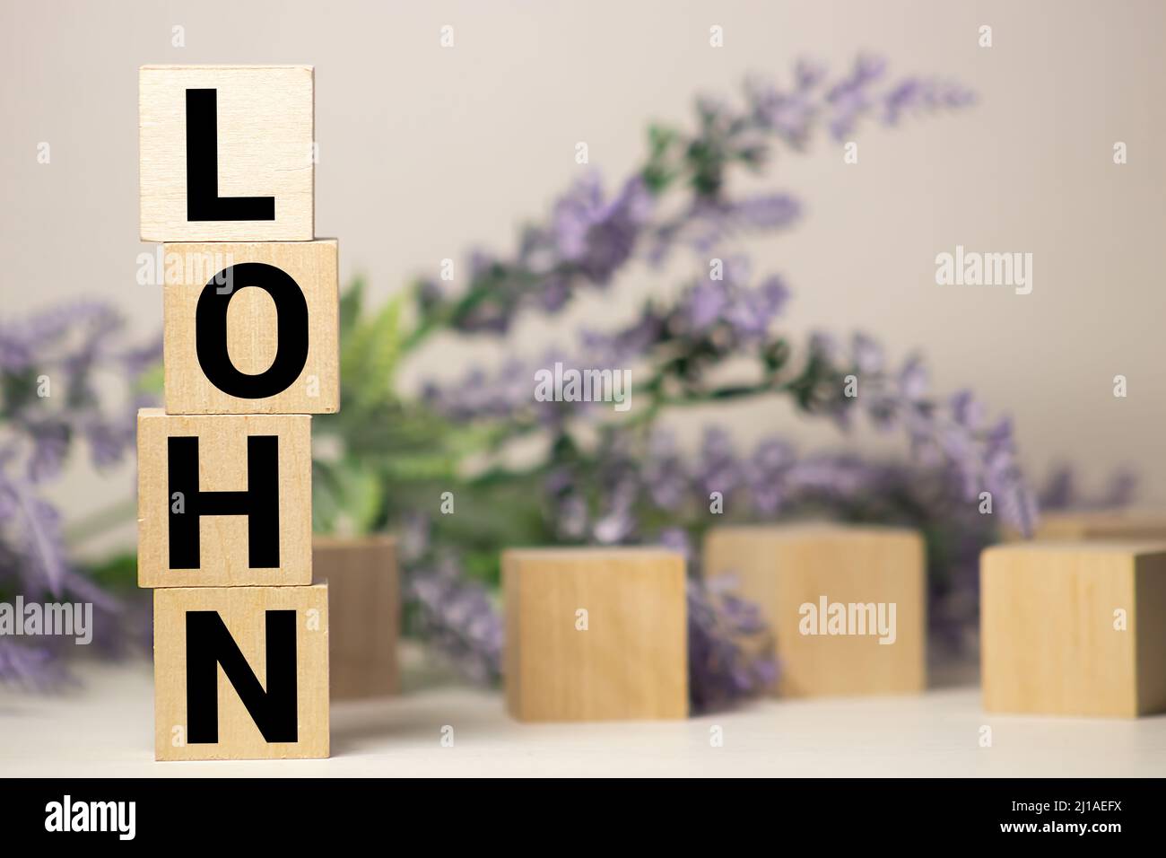 Dice form the German words Lohn which symbolize a ridiculous low salary ...