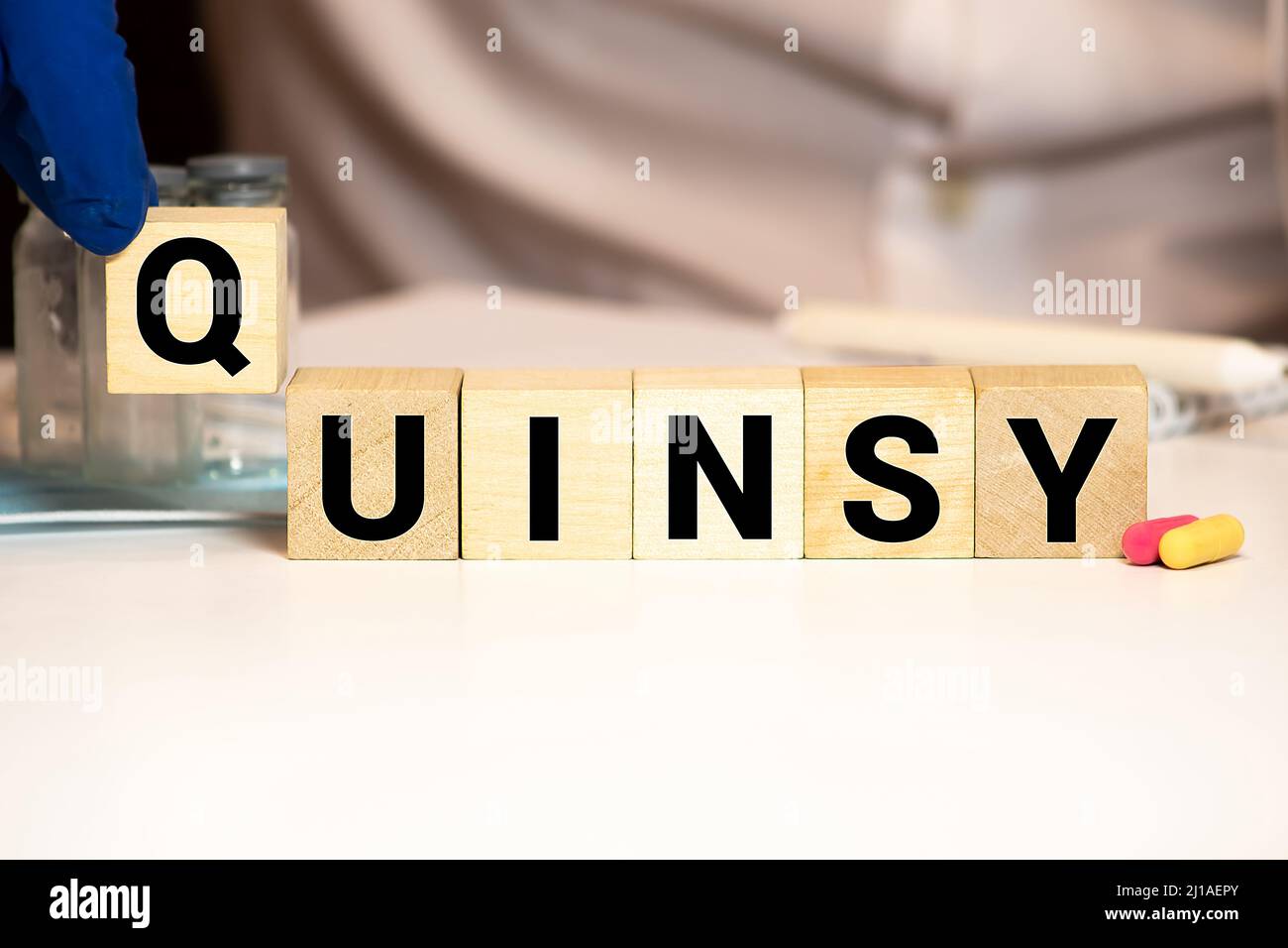 quinsy word on wooden cubes. quinsy concept. medical concept Stock ...