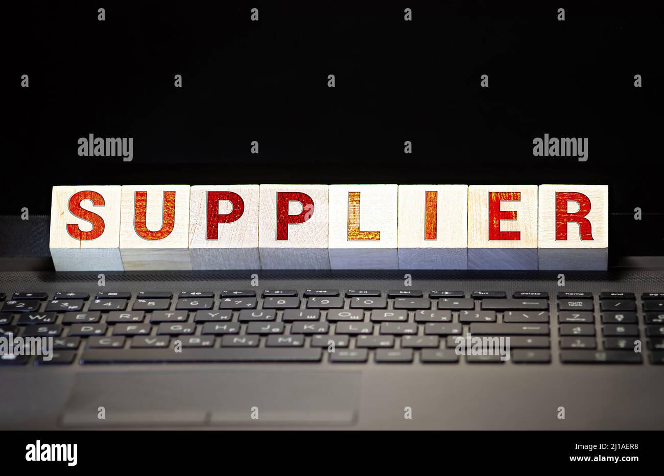 SUPPLIER word made with building blocks, concept Stock Photo - Alamy