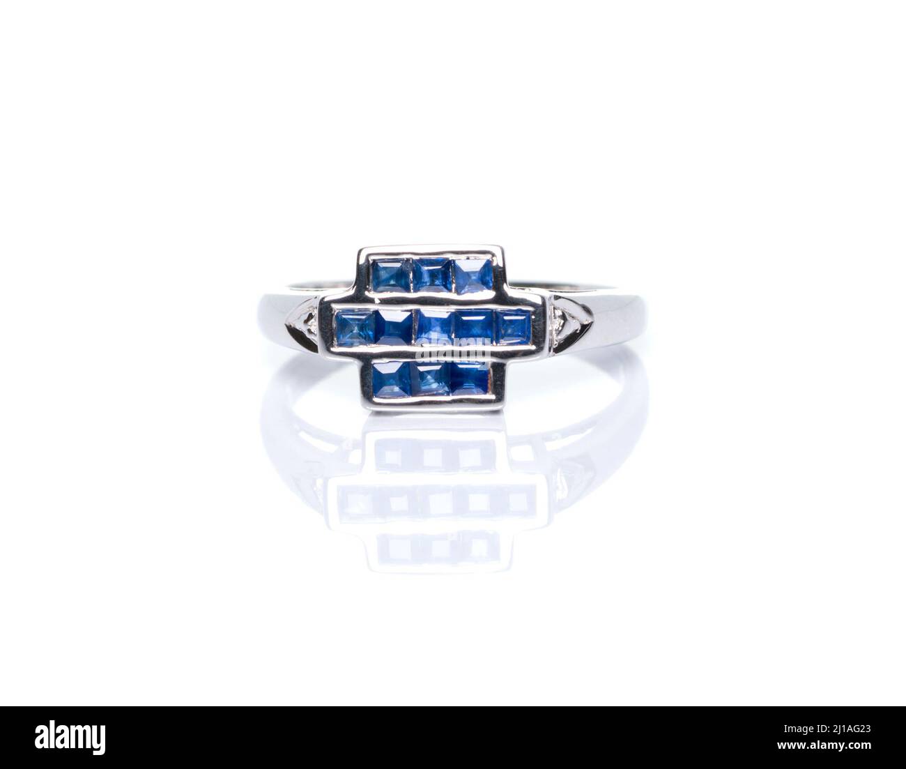 Blue Sapphires Jewel or gems ring on white background with reflection ...