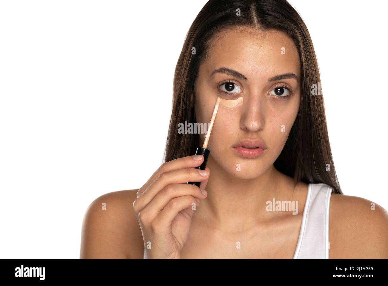 Young woman applies under hi-res stock photography and images - Alamy
