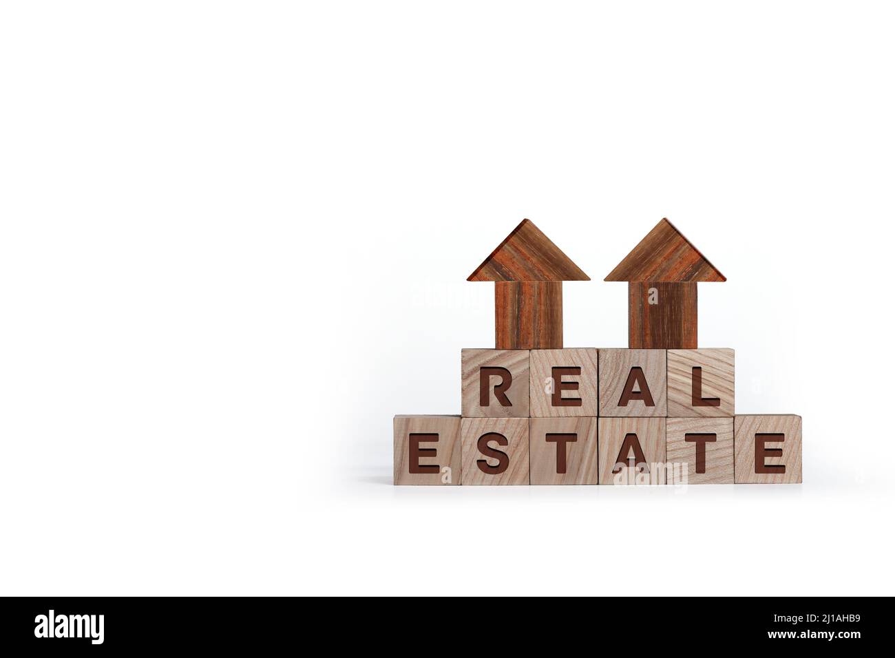 Real estate concept made of blocks with home sign isolated on white ...