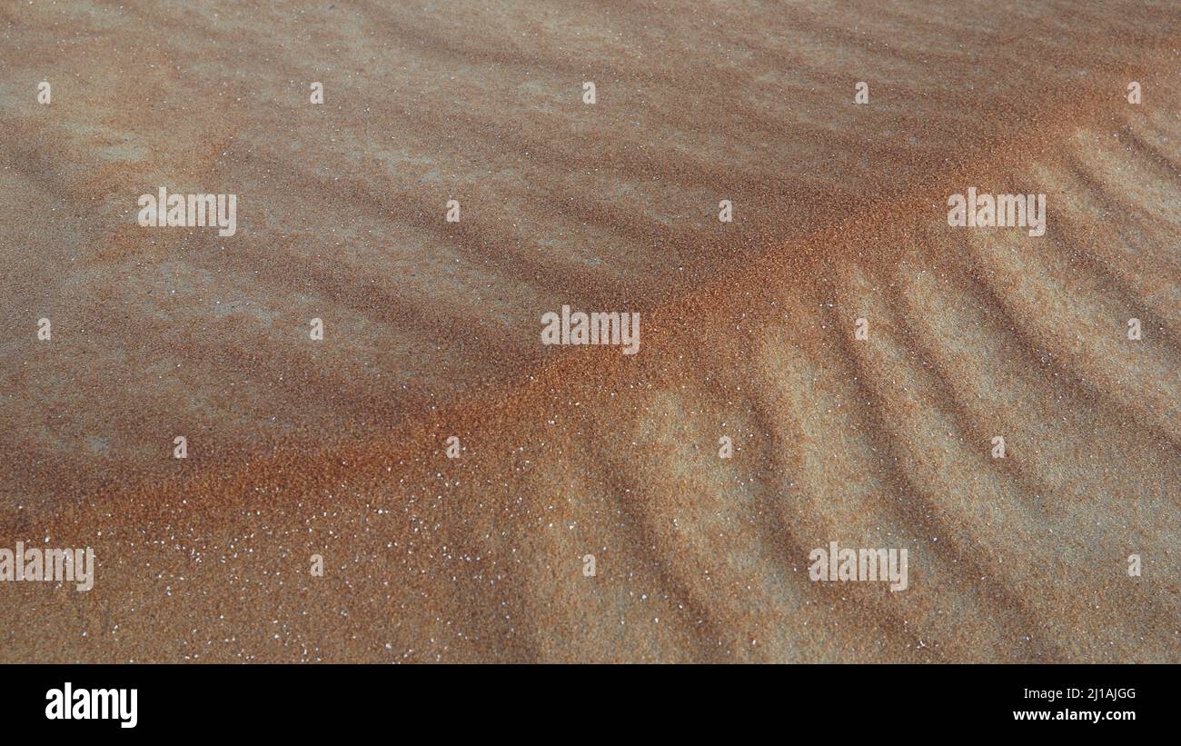 Red orange desert sand texture with white coral sprinkles in the Empty ...