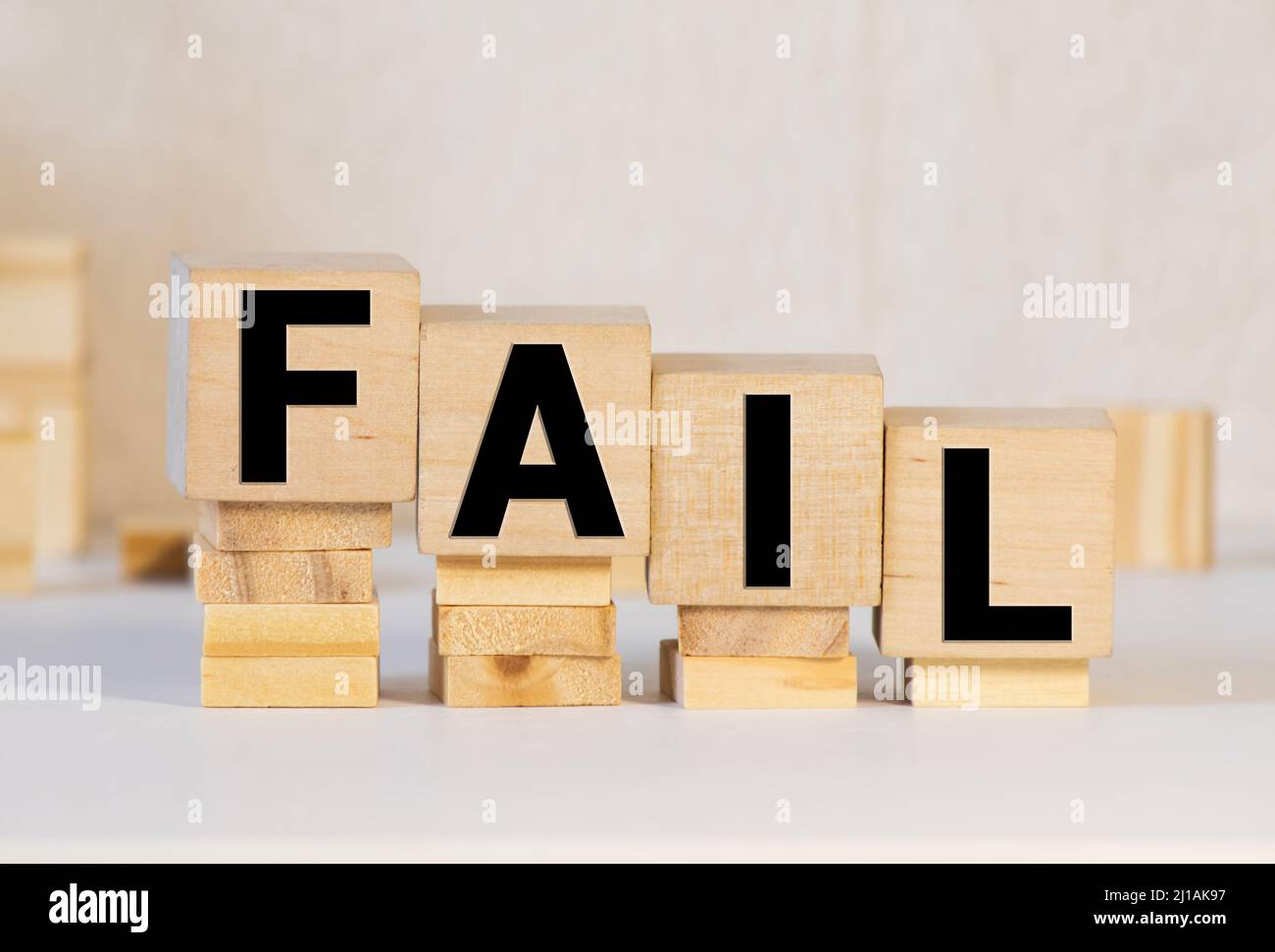 Fail word from wooden blocks on desk Stock Photo - Alamy