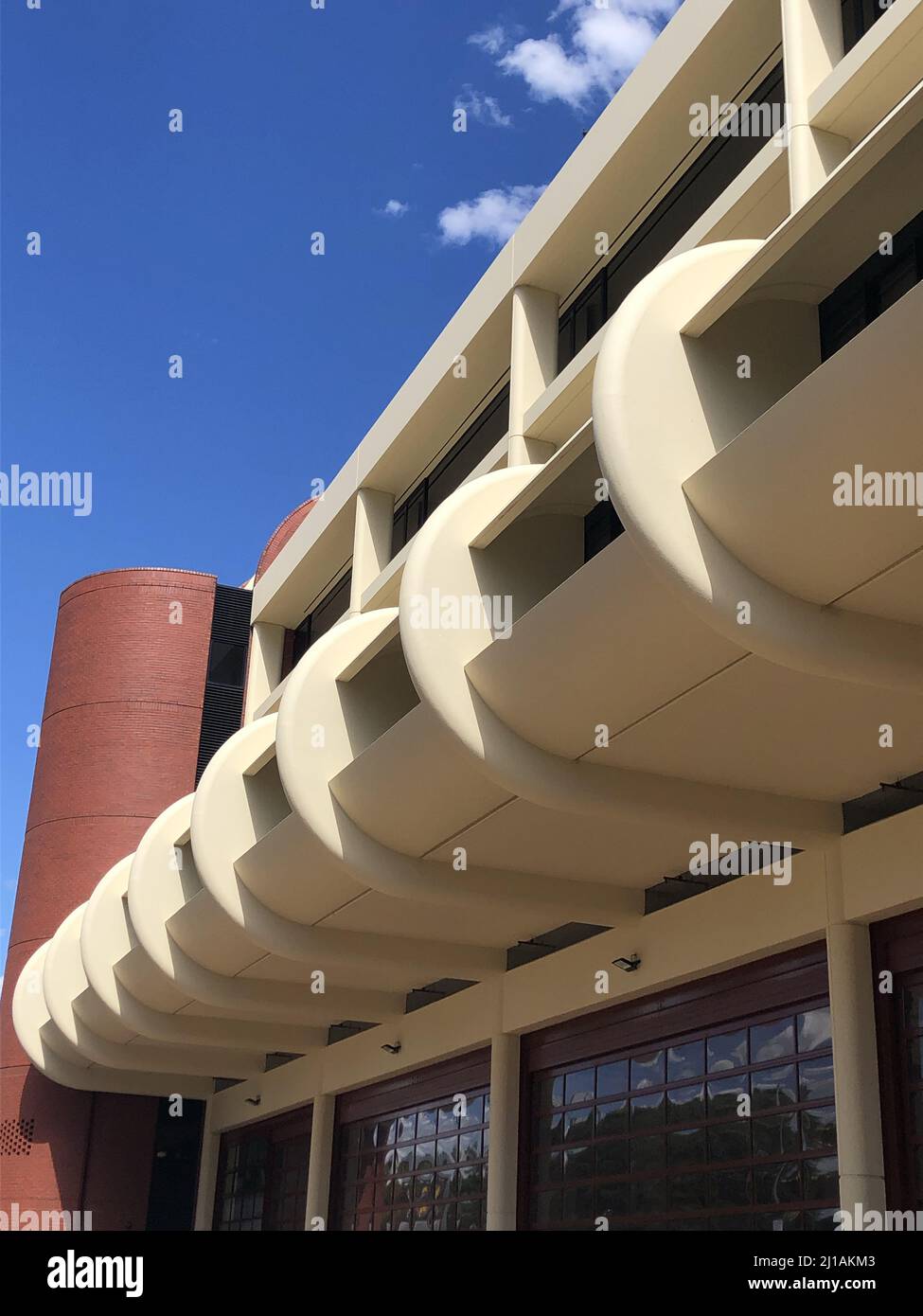 unusual architectural design of inner city firehouse cream colour ...