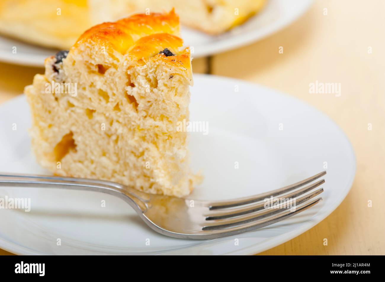 fresh home baked blueberry bread cake dessert over white wood table ...