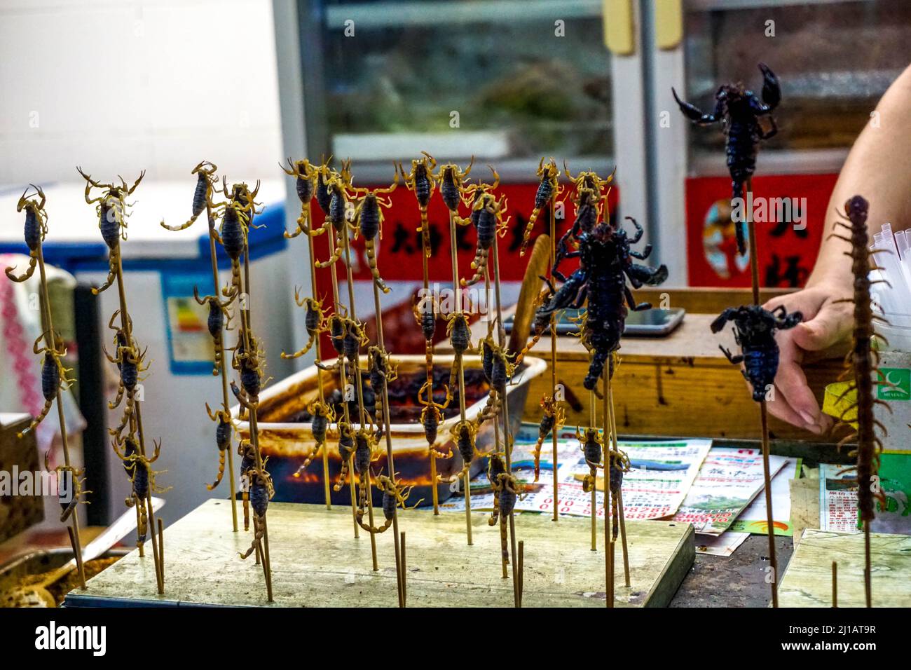 Extreme streetfood in Beijing, China - scorpions on a stick Stock Photo ...