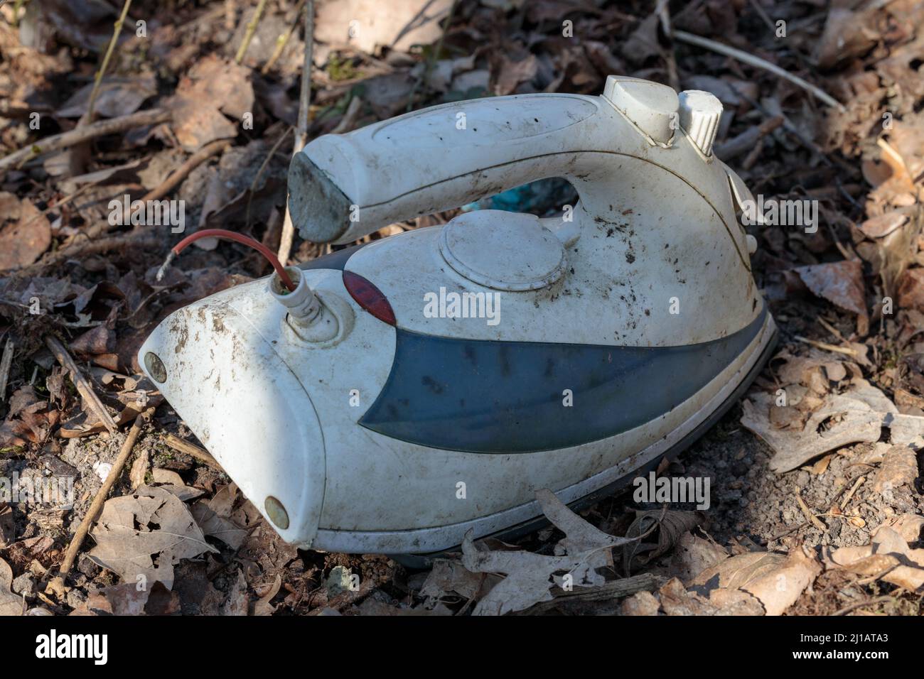 Electro junk, abandoned in the woods. The problem with recycling. An ...
