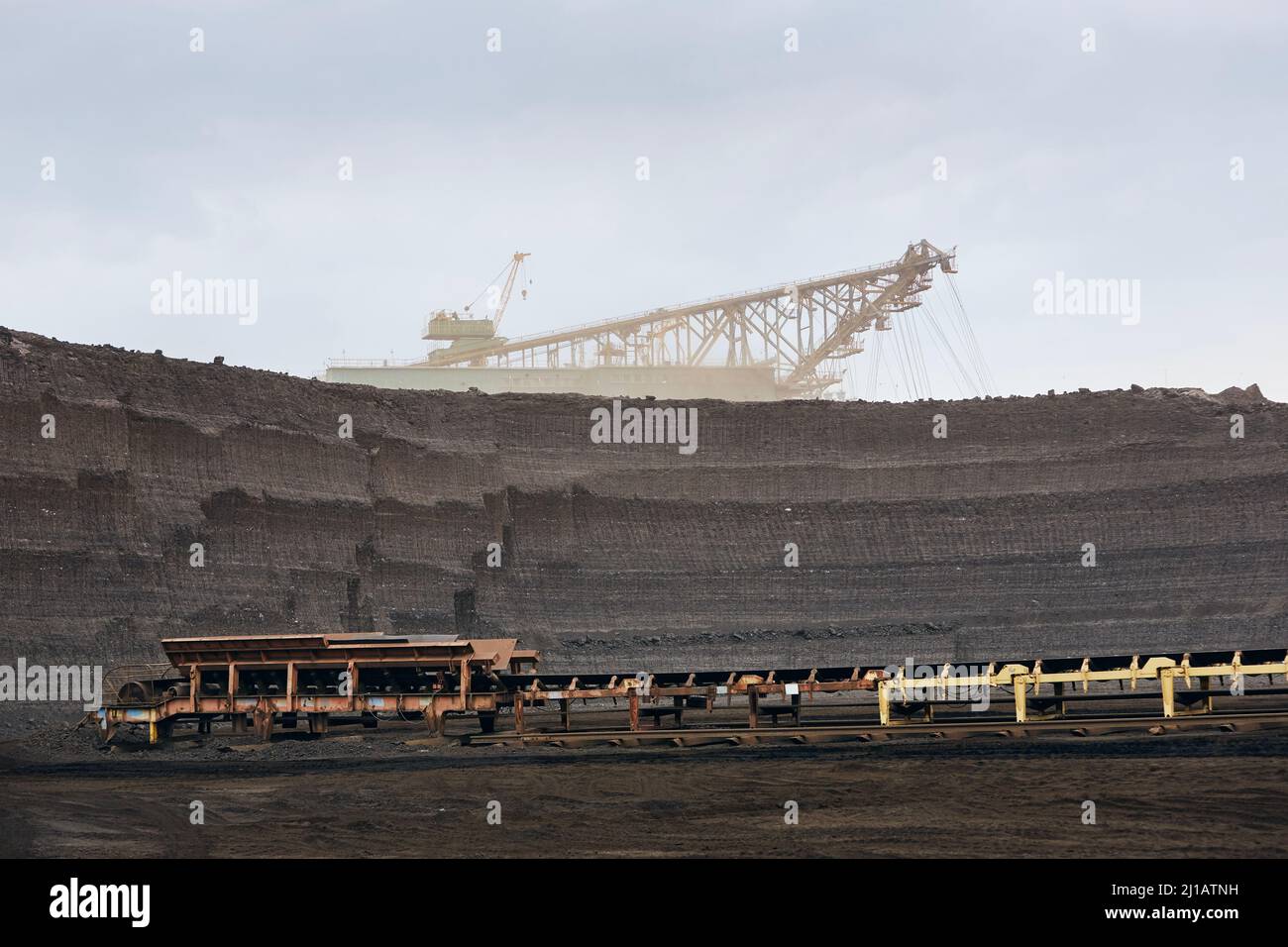 Coal mining in surface mine. Huge bucket excavator during mining Stock ...