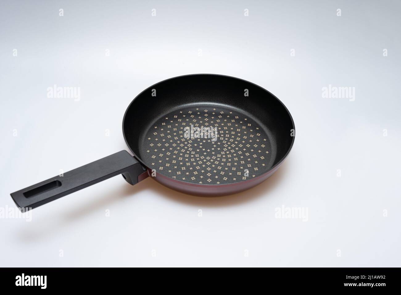 Cooking frying pan on a white background Stock Photo - Alamy