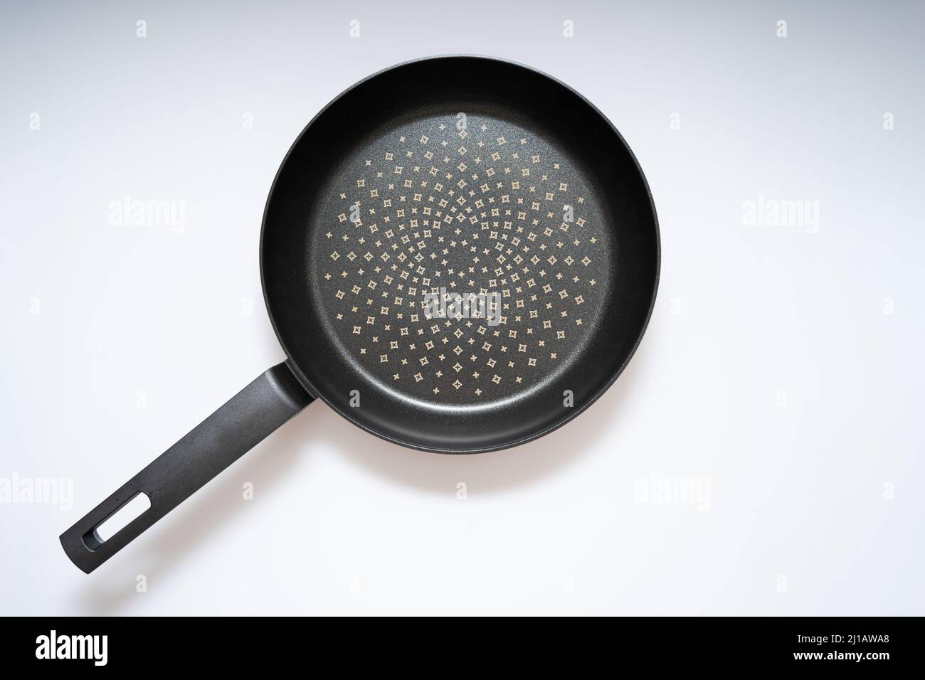 Cooking frying pan on a white background Stock Photo - Alamy