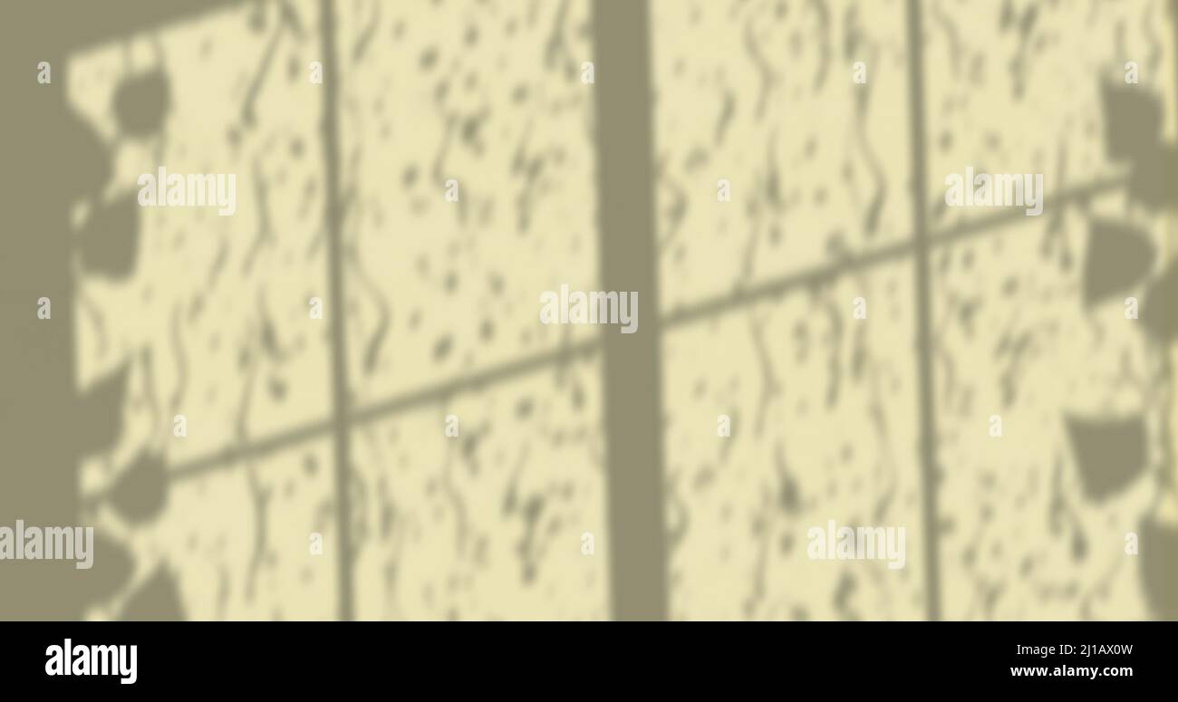 Image of window shadow of leaves and rain falling on yellow background ...