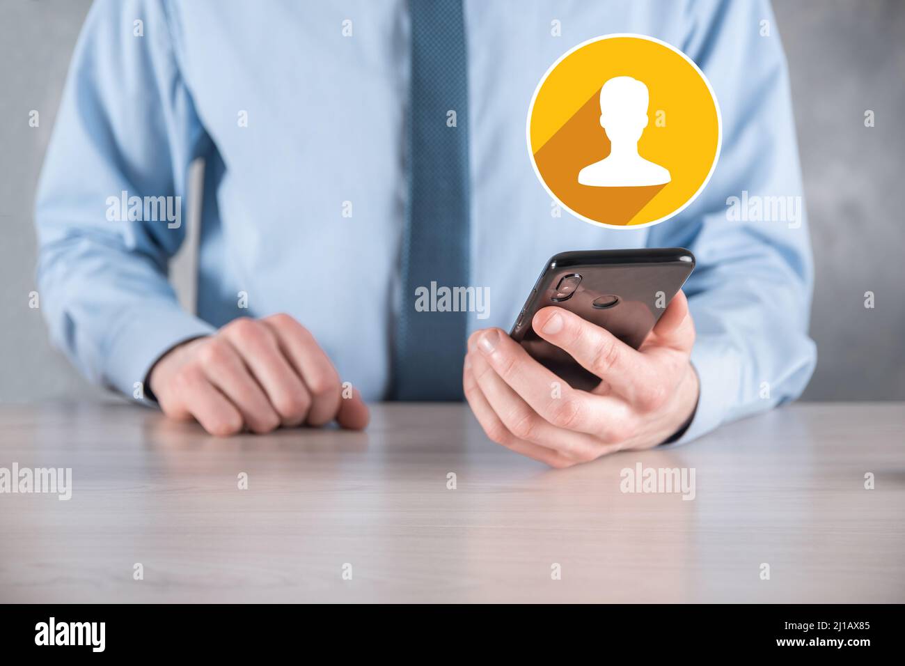 Businessman holding on hand icon of user man,woman low poly polygon ...