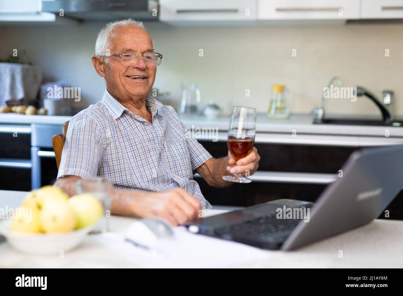 Old having video call on laptop Stock Photo - Alamy