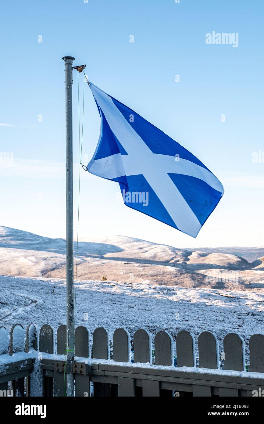 The Scottish flag ( aka 'The Saltire' ) flying at the ski resort lodge ...
