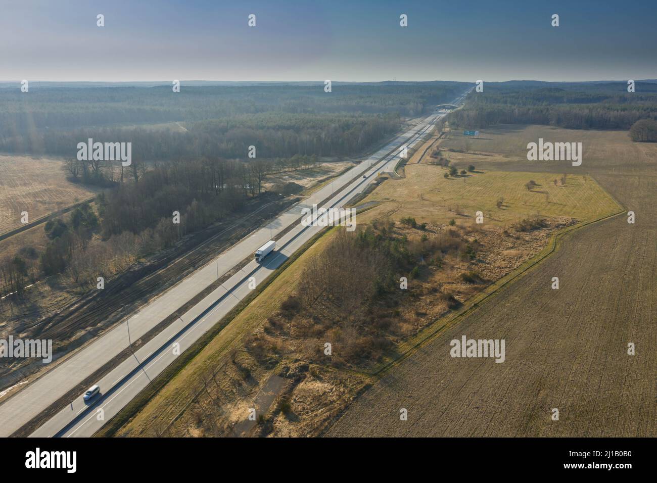 A vast plain covered with meadows, arable lands and forests. In the ...