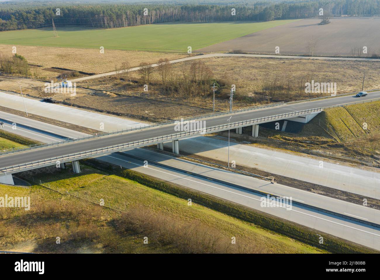 A vast plain. A collision-free intersection of two roads. One of them ...