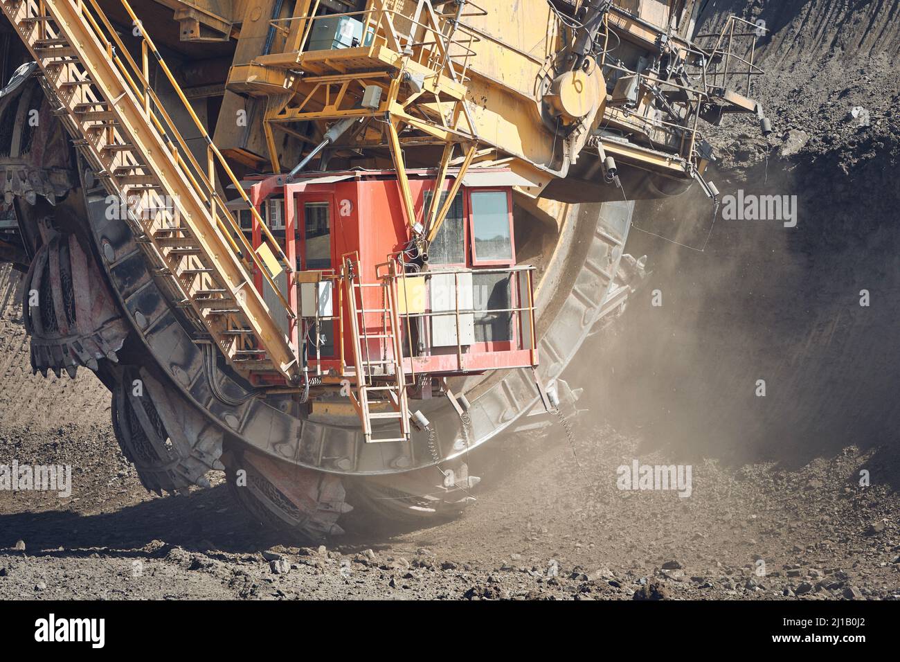 Coal mining in surface mine. Huge bucket excavator during mining Stock ...
