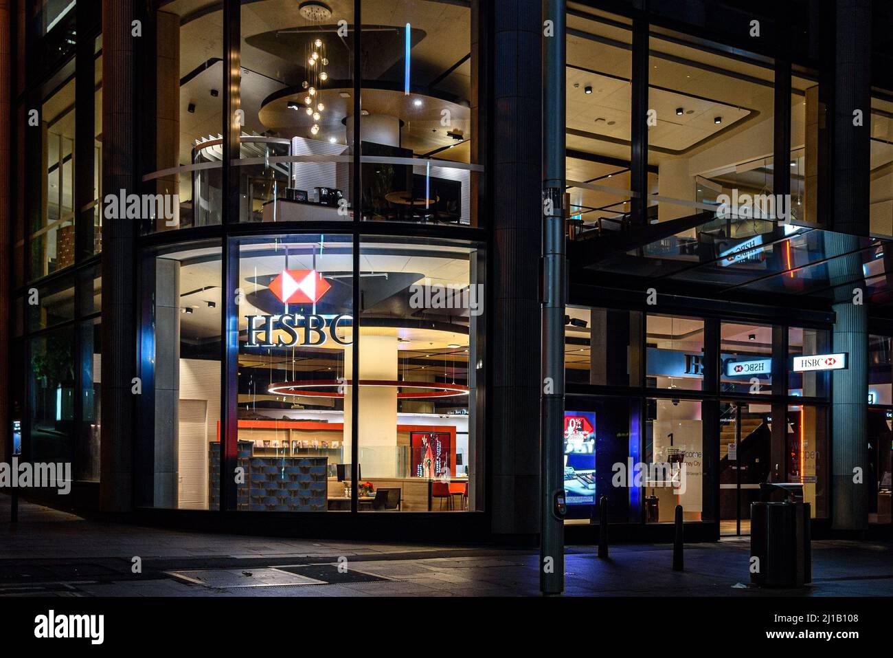 An HSBC bank branch on George Street in the Sydney CBD at night Stock ...