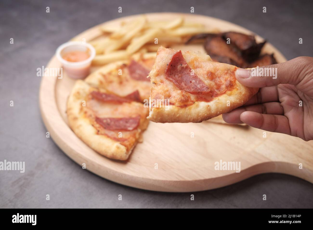 Hand picking up paper hi-res stock photography and images - Alamy