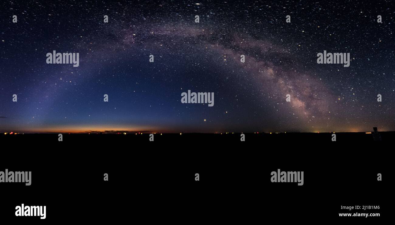 A magical view of the full arch Milky Way starry sky over the Badlands ...