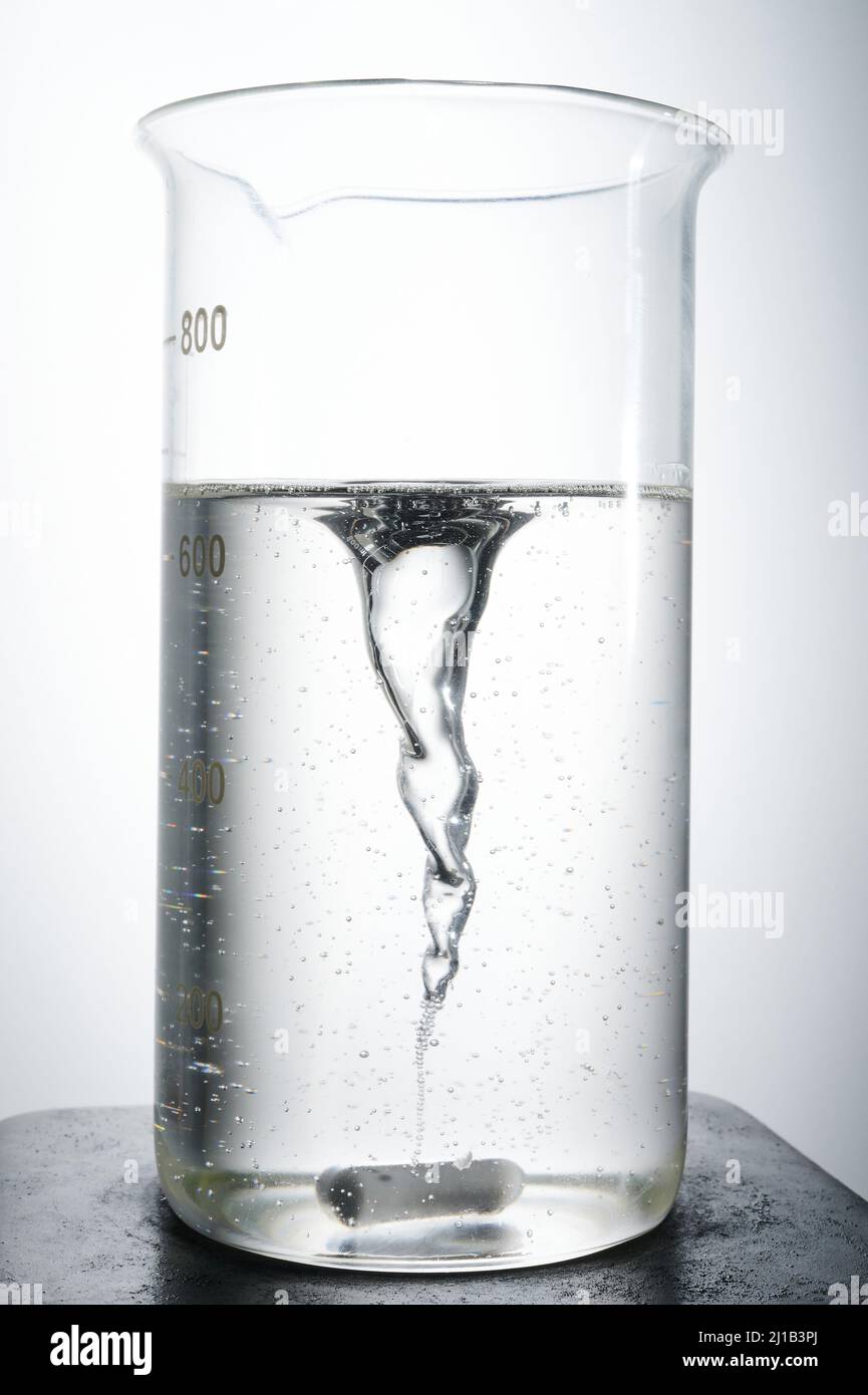 Chemical research with liquid wax in flask isolated Stock Photo - Alamy