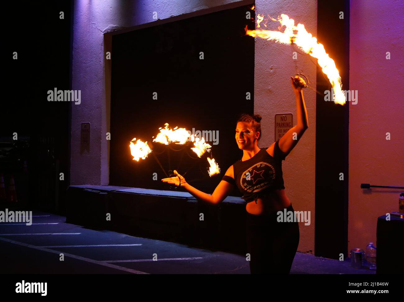 Fire performer Kaitlin Murdock performs during Mark Messina's birthday ...