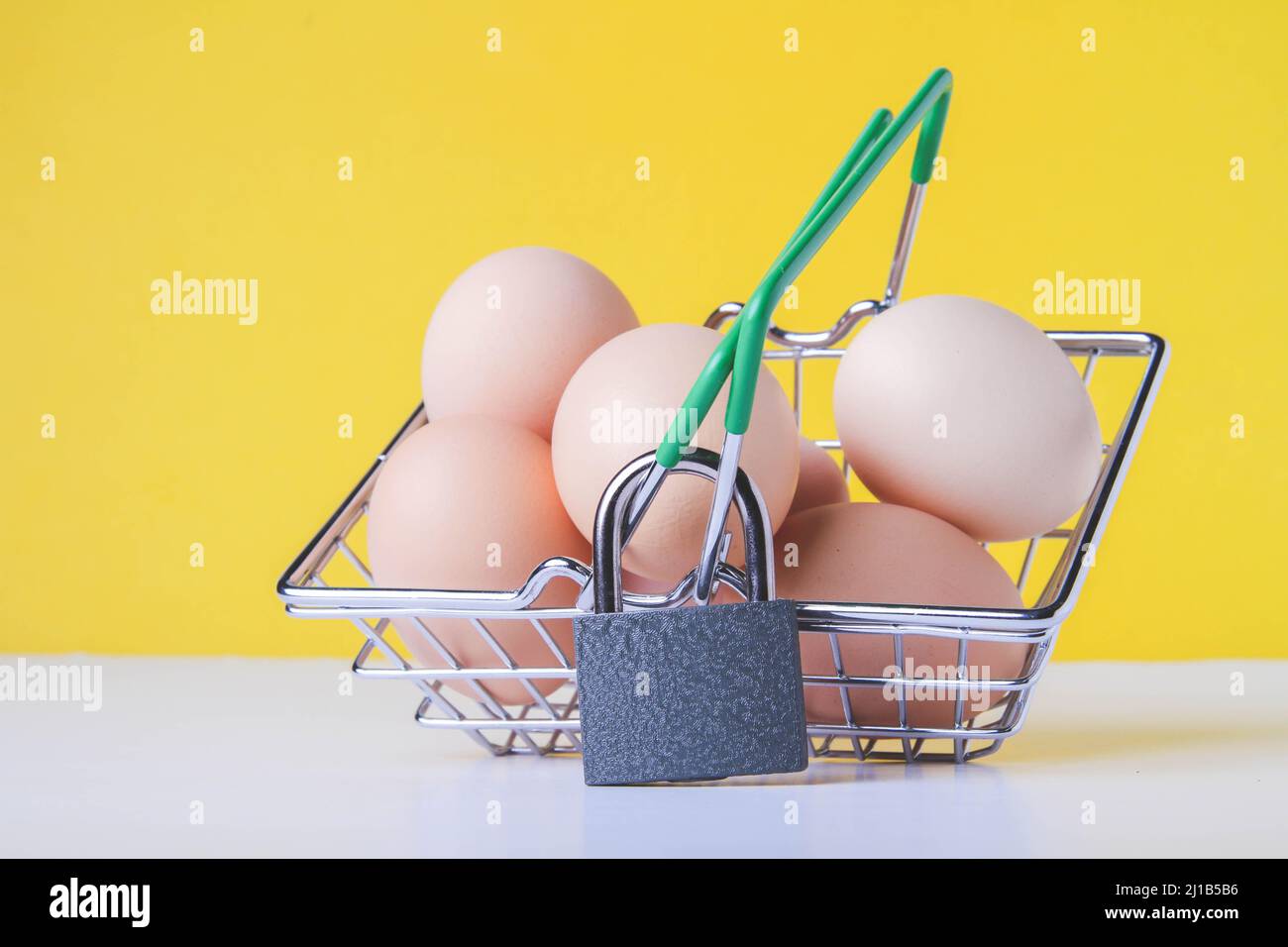 Ban on the sale of chicken eggs. Food sanctions. Basket with groceries ...
