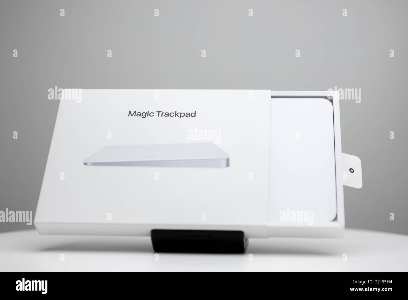 Half openend white package box of Mac Apple magic trackpad on display ...