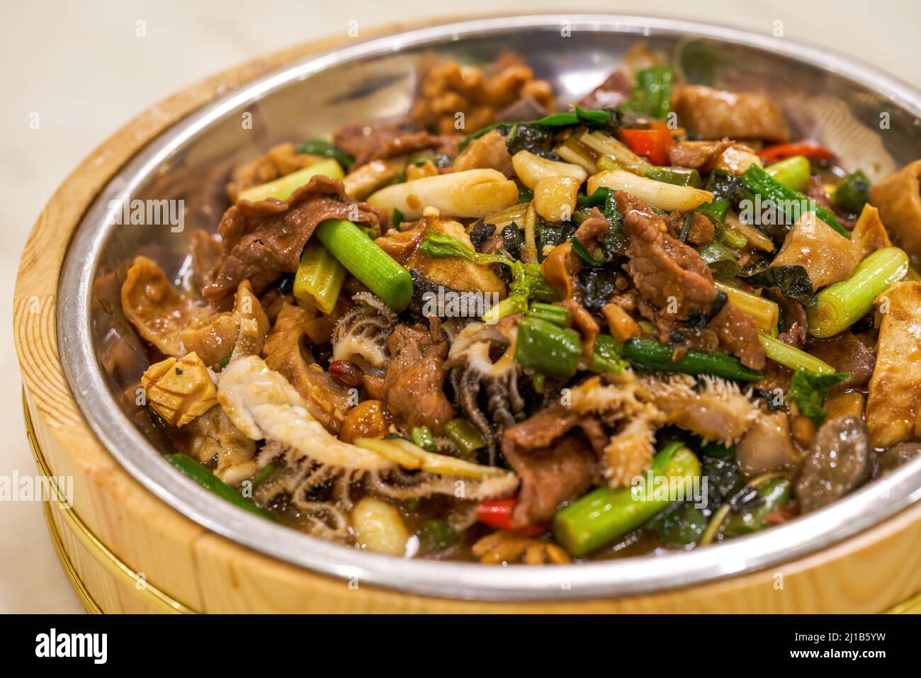 A delicious Guangxi dish, stir-fried beef offal Stock Photo - Alamy