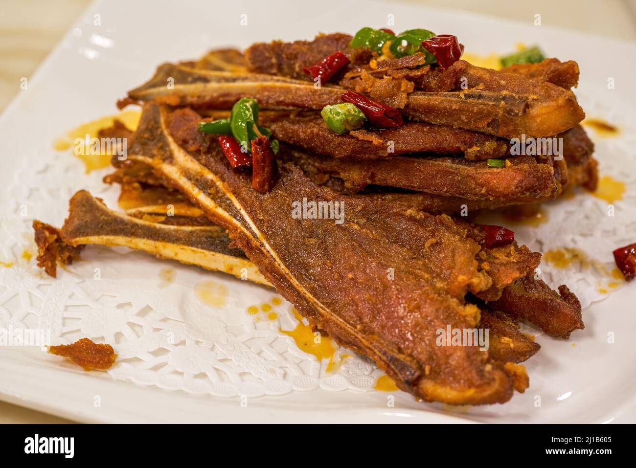 A crispy and delicious Guangxi dish, pork fan bone with salt and pepper ...