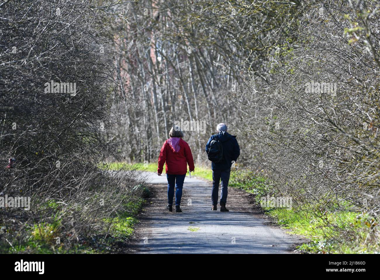 people walking along a country path Stock Photo - Alamy