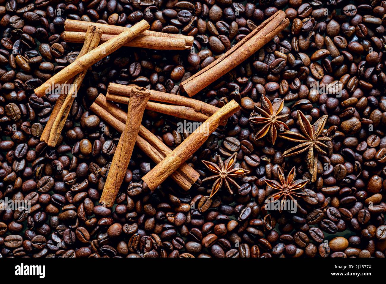 Roasted coffee beans, background image, spices, cinnamon, coriander ...