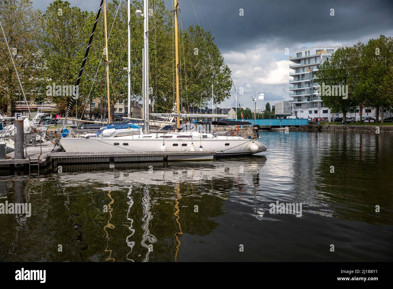 BOAT IN THE MARINA IN FRONT OF THE PENINSULA, CAEN, CALVADOS, NORMANDY ...