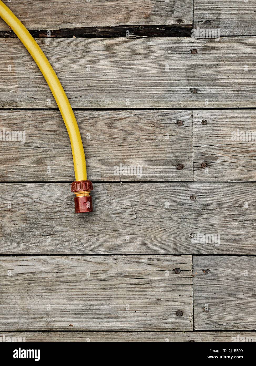 Yellow hose pipe hi-res stock photography and images - Alamy