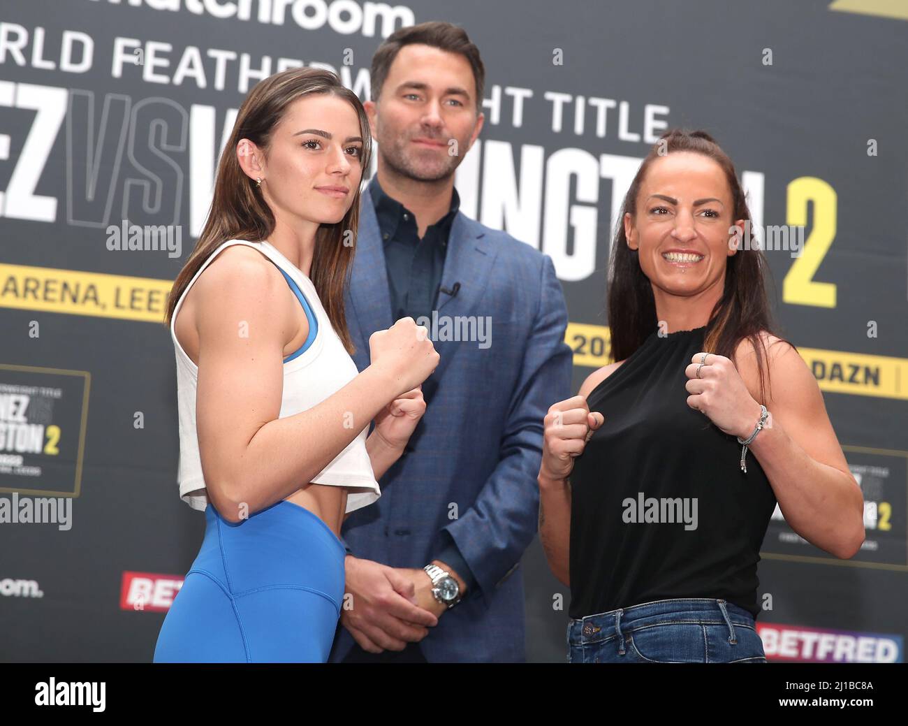 Sky Nicolson (left) and Bec Connolly face off as Eddie Hearn looks on ...