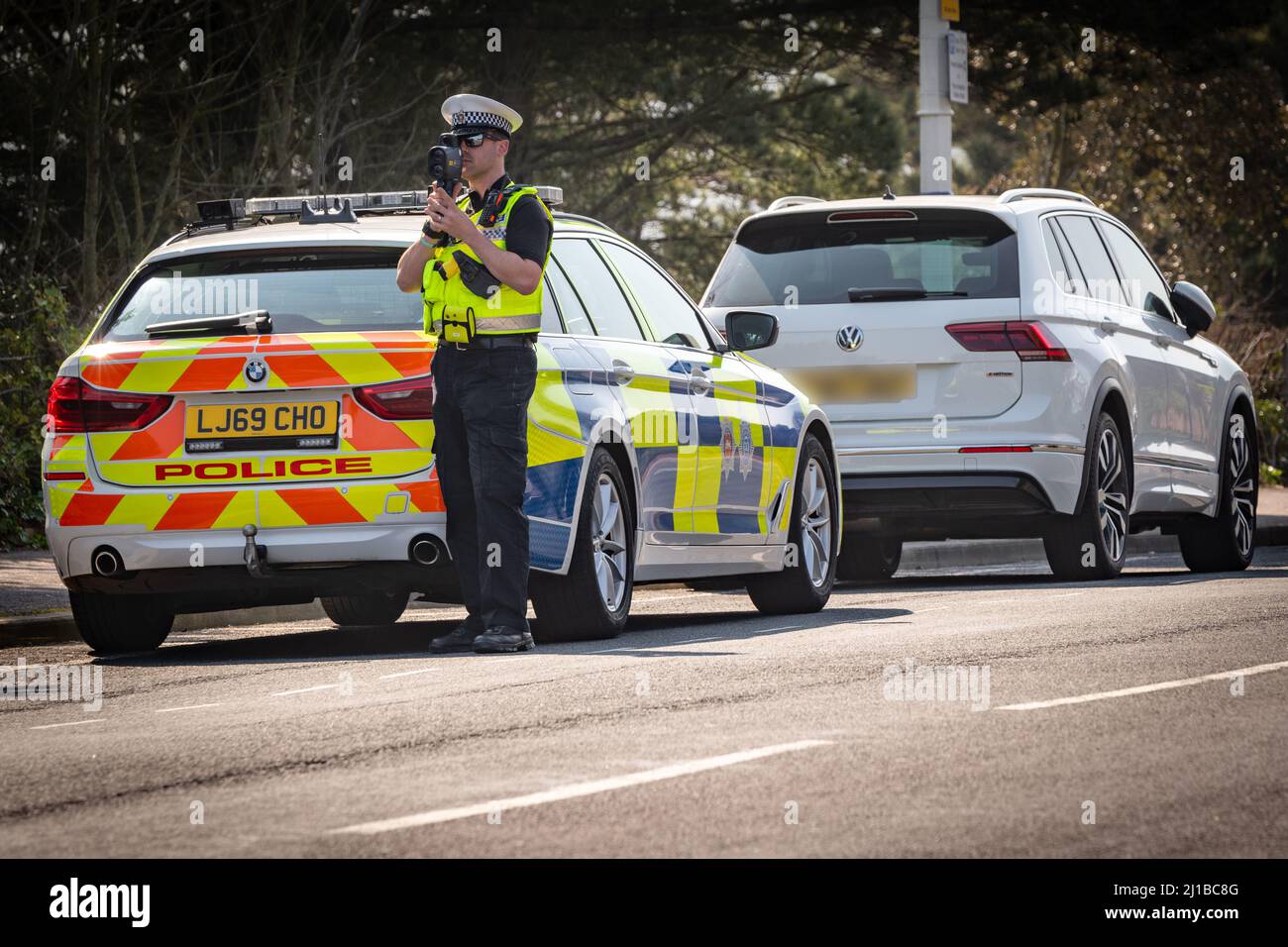 Police car looking dor speeding cars hi-res stock photography and ...