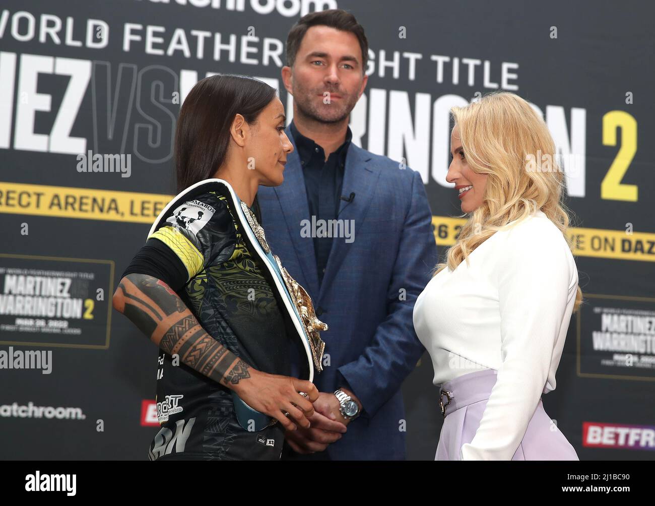Maria Cecilia Roman (left) and Ebanie Bridges face off as Eddie Hearn ...