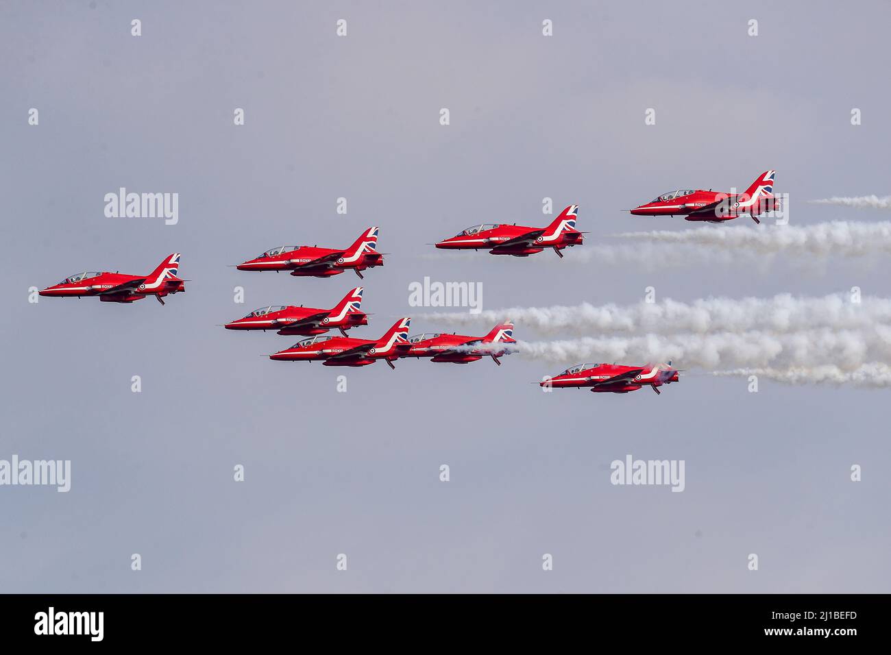 RAF Red Arrows acrobatic flying team perform a flypast over RAF Leeming ...