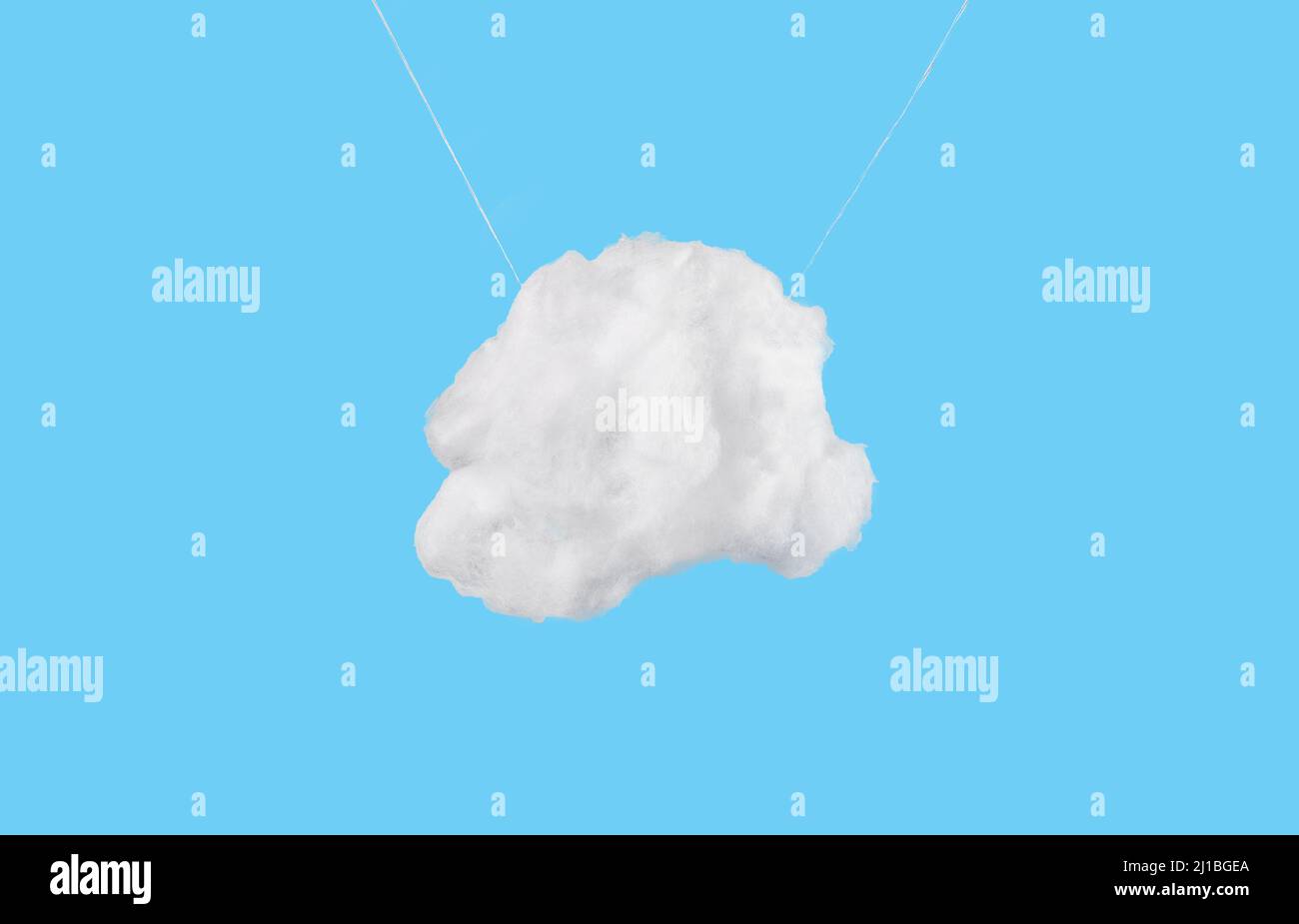 White cotton cloud hanging on strings on blue background. Hope, peace ...