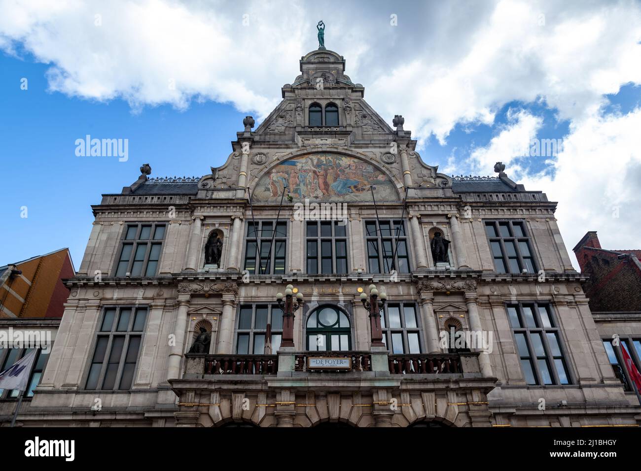 The facade of flemish historical buildings in Ghent, Belgium under the ...
