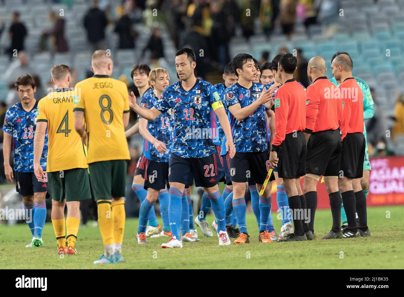 Sydney, Australia. 24th Mar, 2022. Maya Yoshida ( C ) of Japan shake ...
