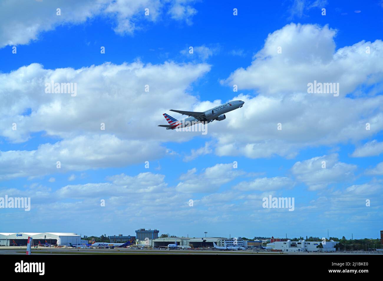 MIAMI, FL -13 MAR 2022- View of an airplane in flight from American ...