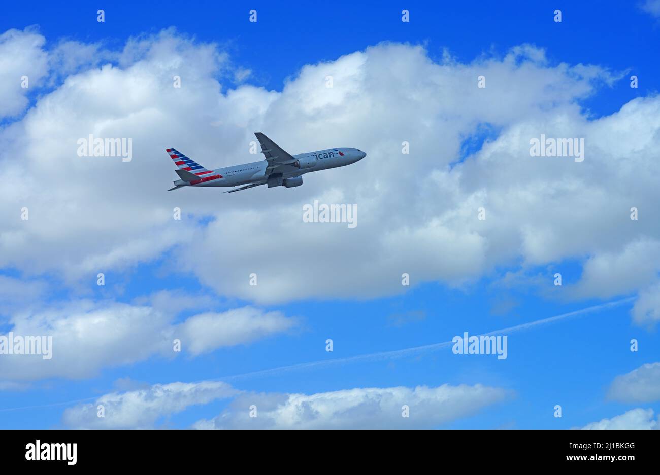 MIAMI, FL -13 MAR 2022- View of an airplane in flight from American ...