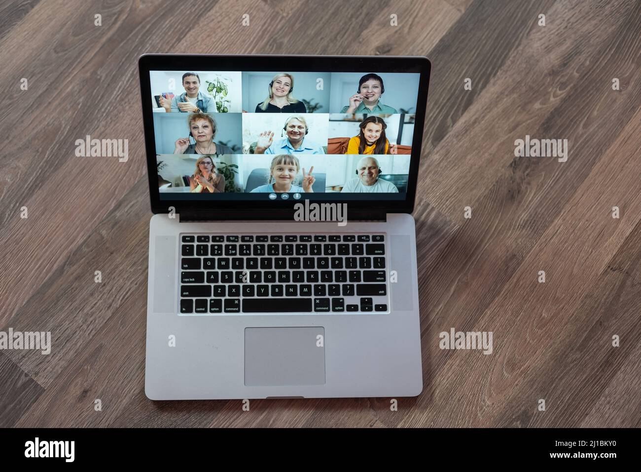 Video Conferencing Call Waving Hello With Hand Stock Photo - Alamy